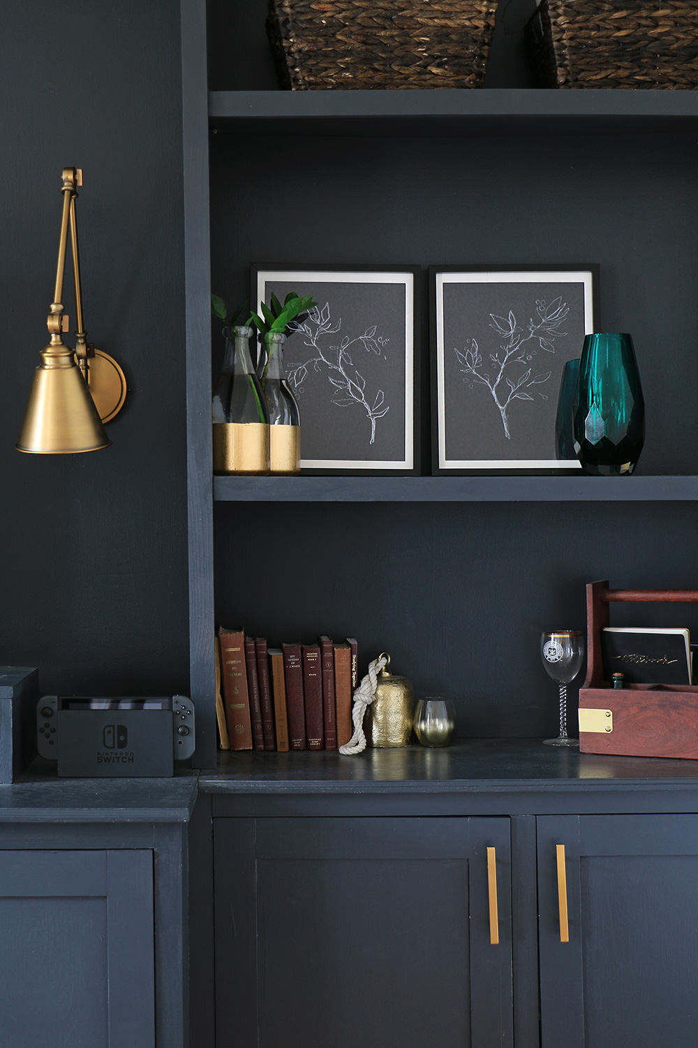 Black framed art in bookcase Home Made By Carmona